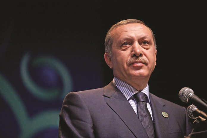 Turkey: Erdogan retains power in narrow victory but crisis will ...